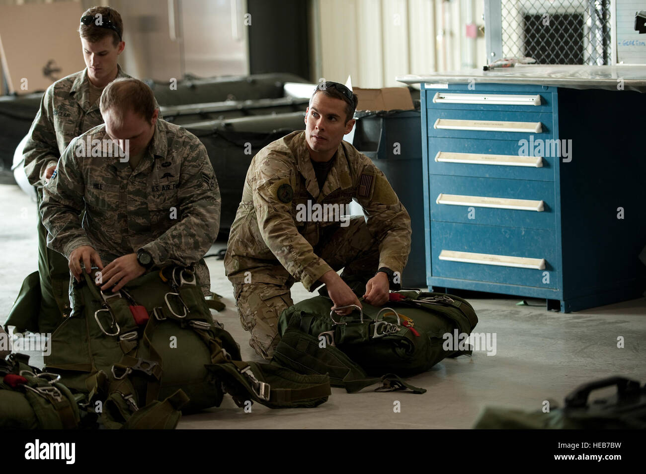 U.S. Air Force pararescuemen, 58th Rescue Squadron, prepare and check ...