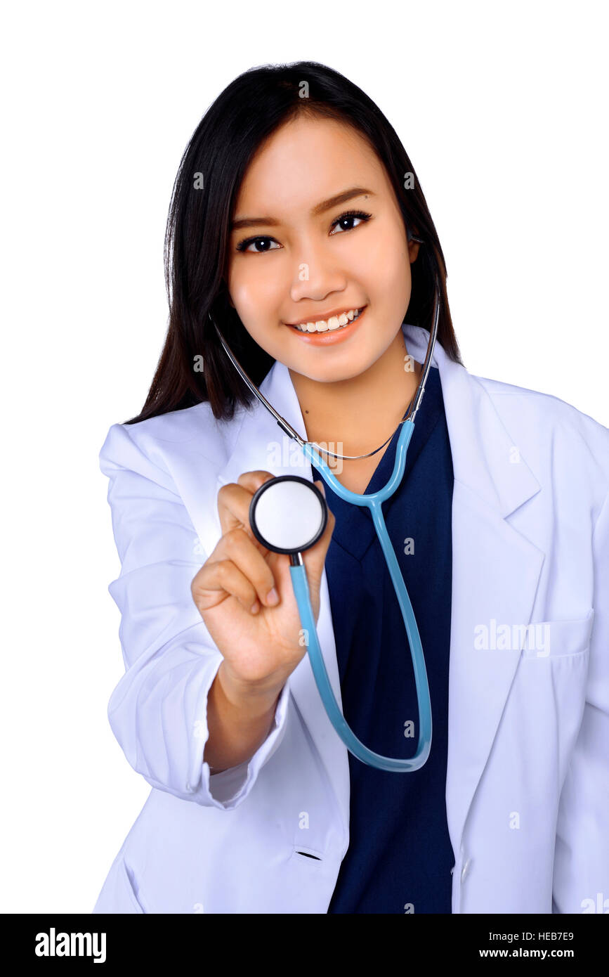 A female doctor with a stethoscope listening, isolated on white ...
