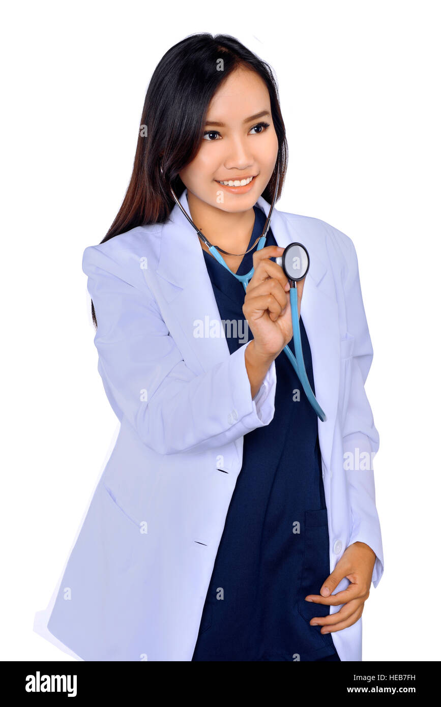 A female doctor with a stethoscope listening, isolated on white ...