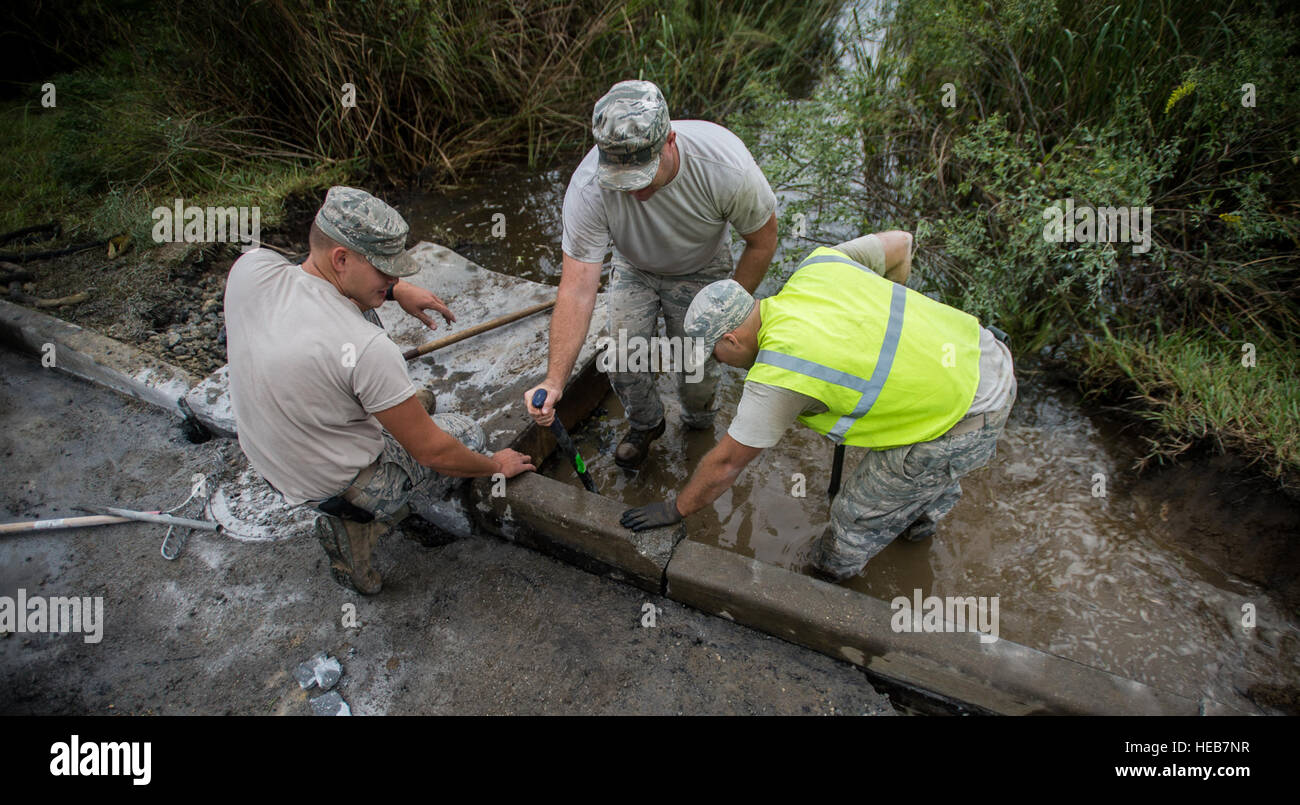 (Left to right) Airman 1st Class Daniel Wade, 628th Civil Engineer ...