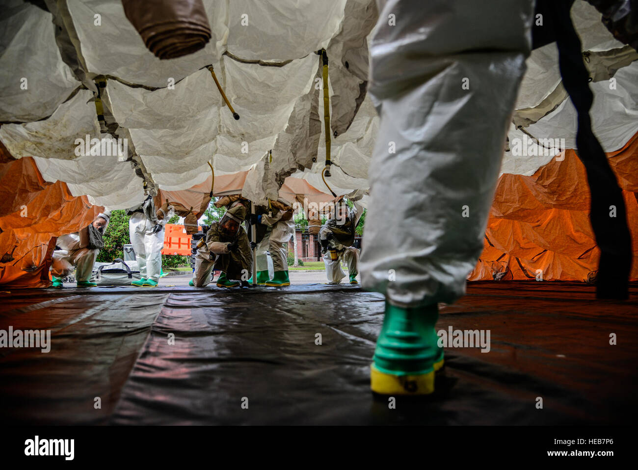 Airmen from the 628th Medical Group, erect a decontamination tent ...