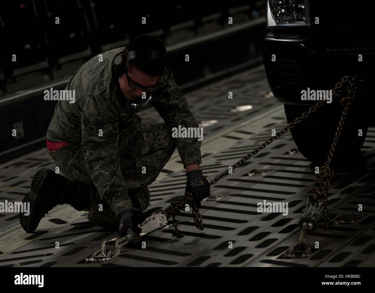 A U.S. Air Force ramp specialist from the 71st Aerial Port Squadron ...