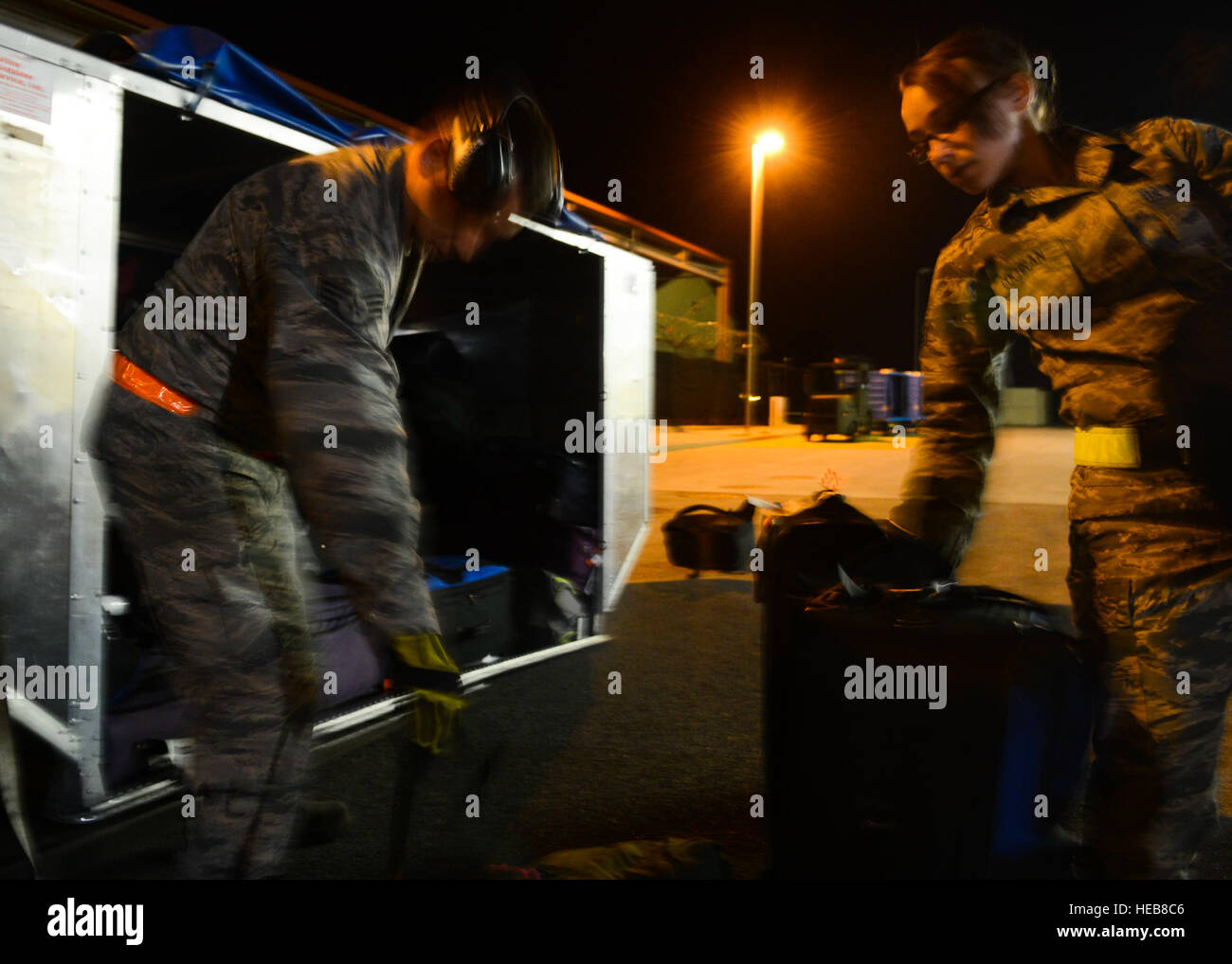 U.S. Air Force Airmen with the 724th Air Mobility Squadron unload ...