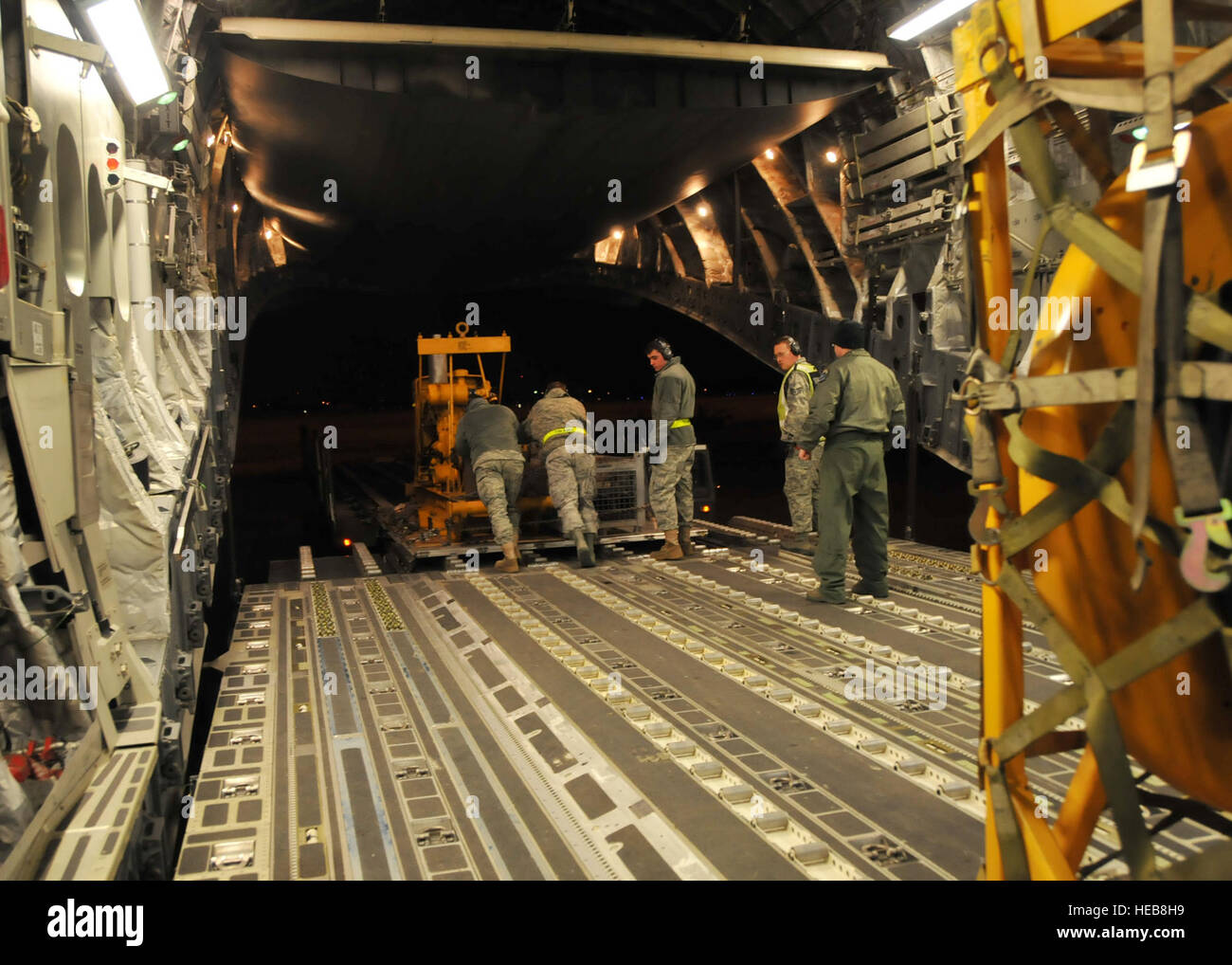 Crew chiefs from the 730th Air Mobility Squadron unloaded U.S. Navy ...