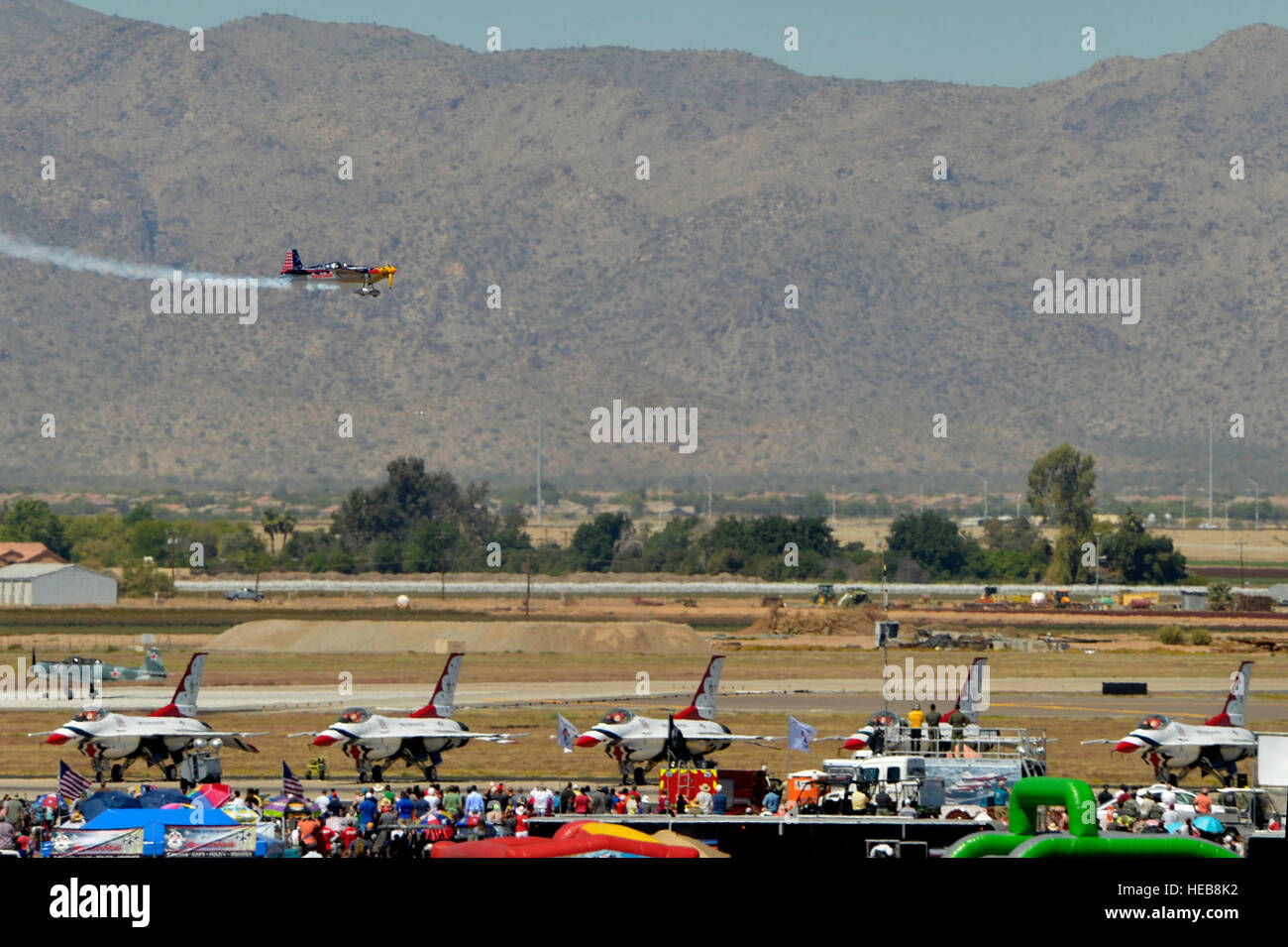 The Red Bull demonstration team performs aerial maneuvers for the crowd ...