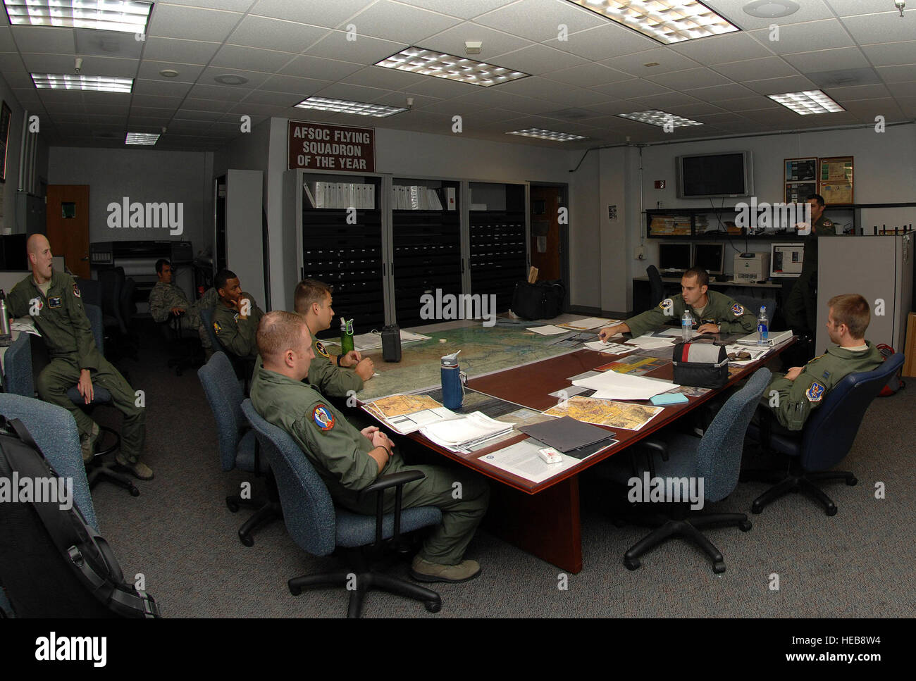 U.S. Air Force Capt. Maxwell Miller, 79th Rescue Squadron pilot, briefs ...