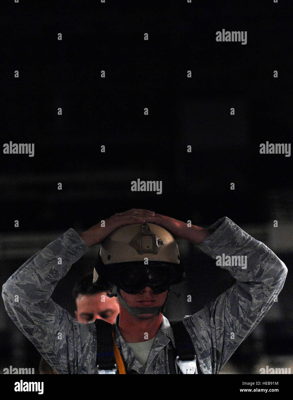 U.S. Air Force Tech. Sgt. James Ward,(back) an airborne engineering ...