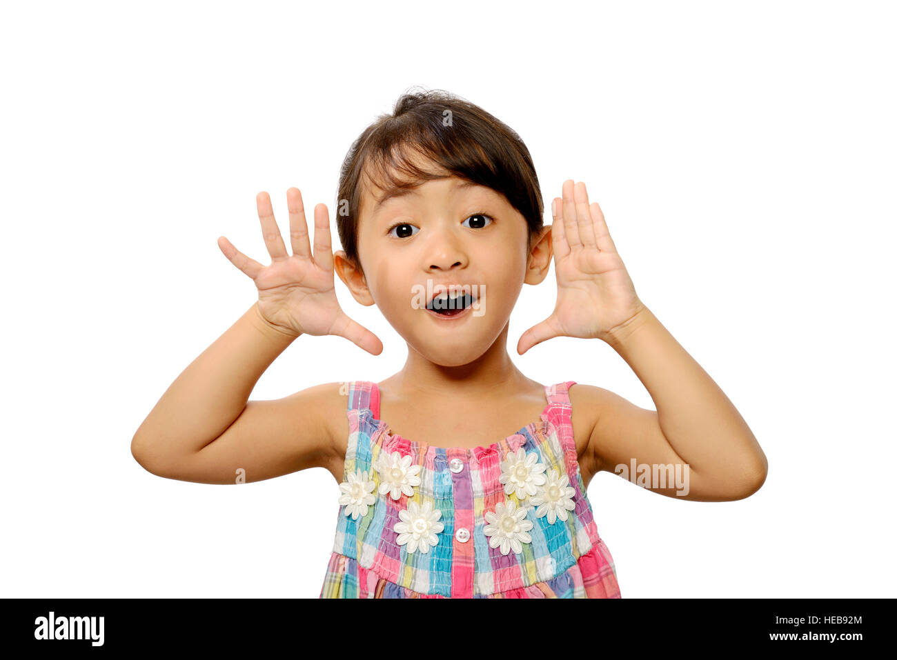 Happy little asian girl isolated over white background Stock Photo - Alamy