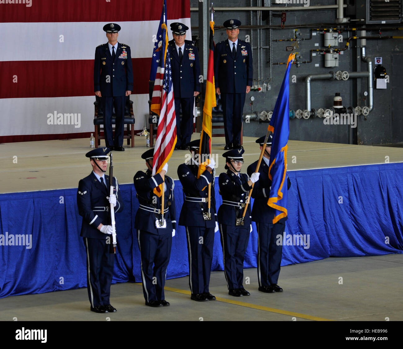 The base honor guard posts the colors during a change of command ...