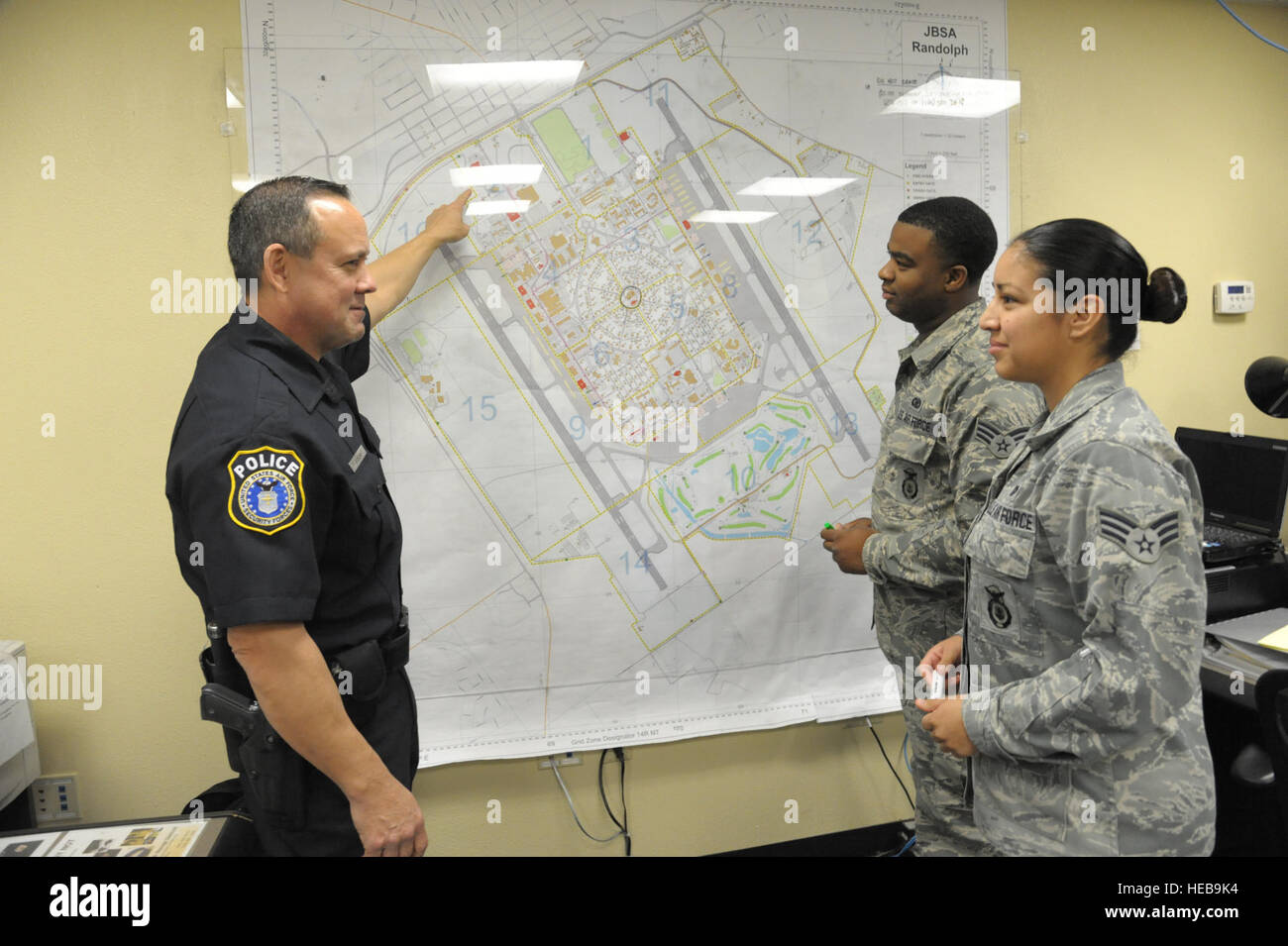 Richard Coon (left), 902nd Security Forces Squadron police supervisor ...