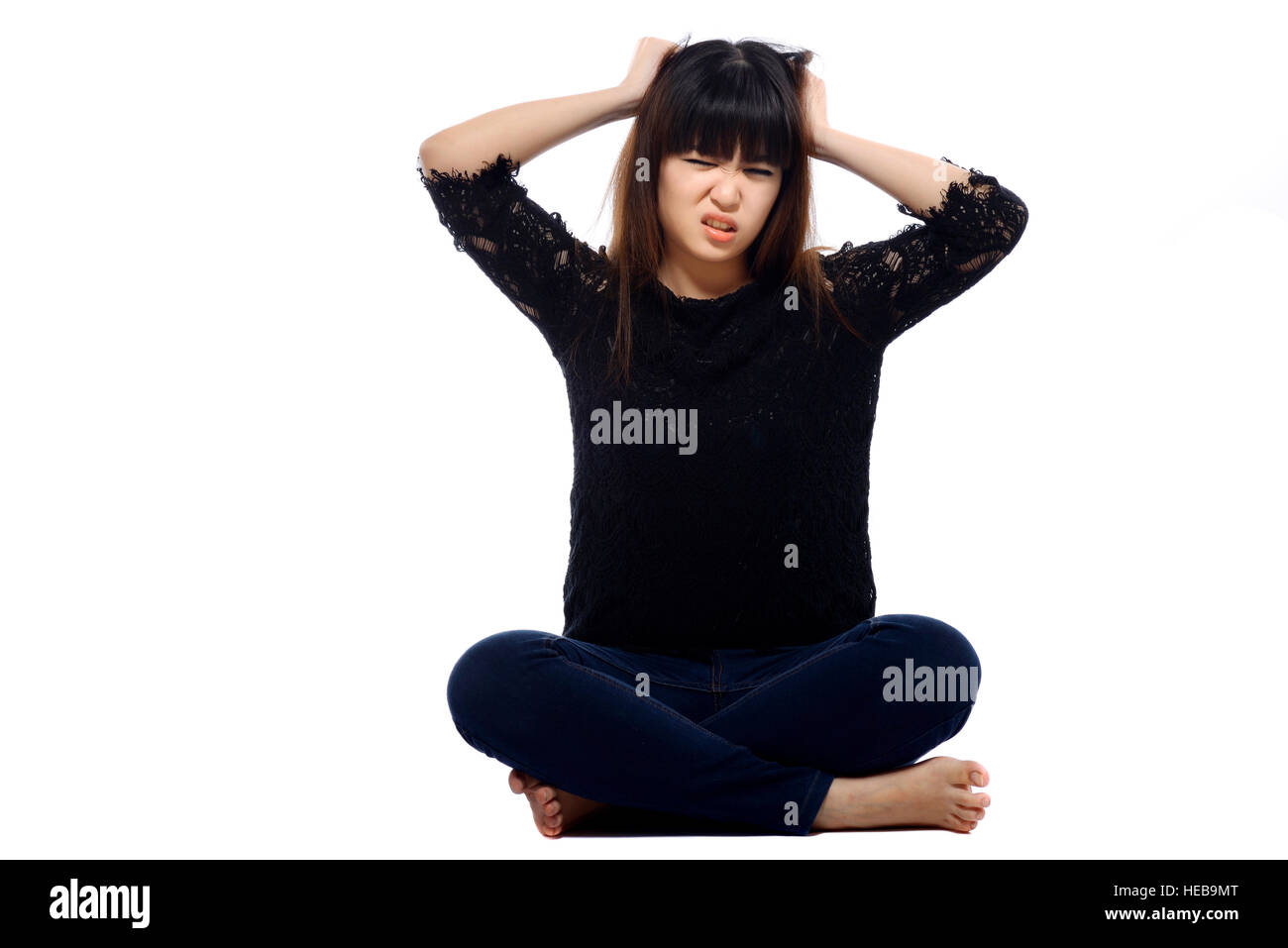 Asian woman get stress isolated over white background Stock Photo - Alamy