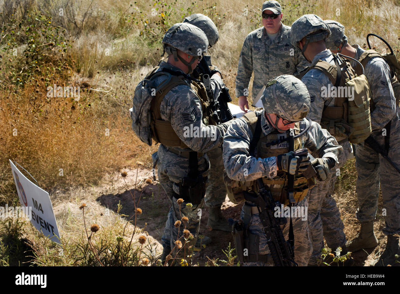 Members of the 91st Security Forces Group Global Strike Challenge team prepare their gear and ...