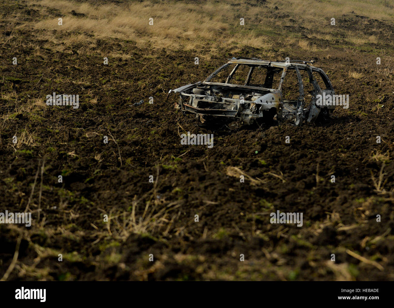 A dummy vehicle displays damage caused from rounds fired from a 30mm ...