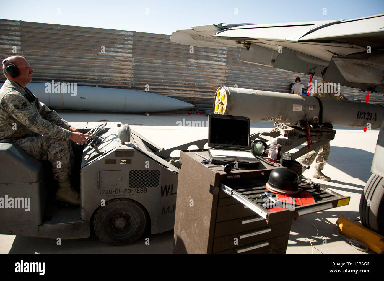 KANDAHAR AIRFIELD, Afghanistan -- (Left) Senior Airman Ken Choate and ...