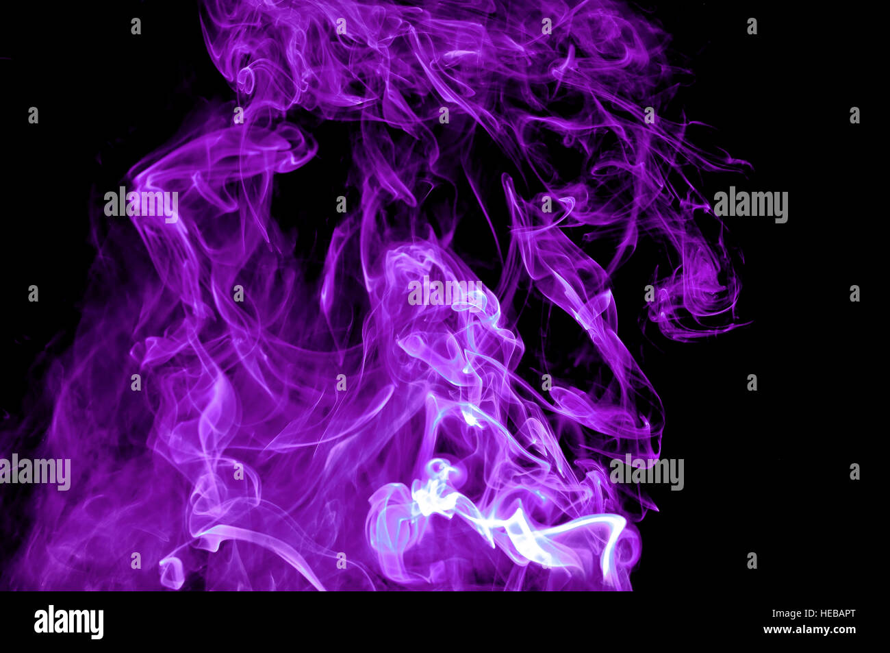 Abstracts purple smoke on black background. Good for your design Stock ...