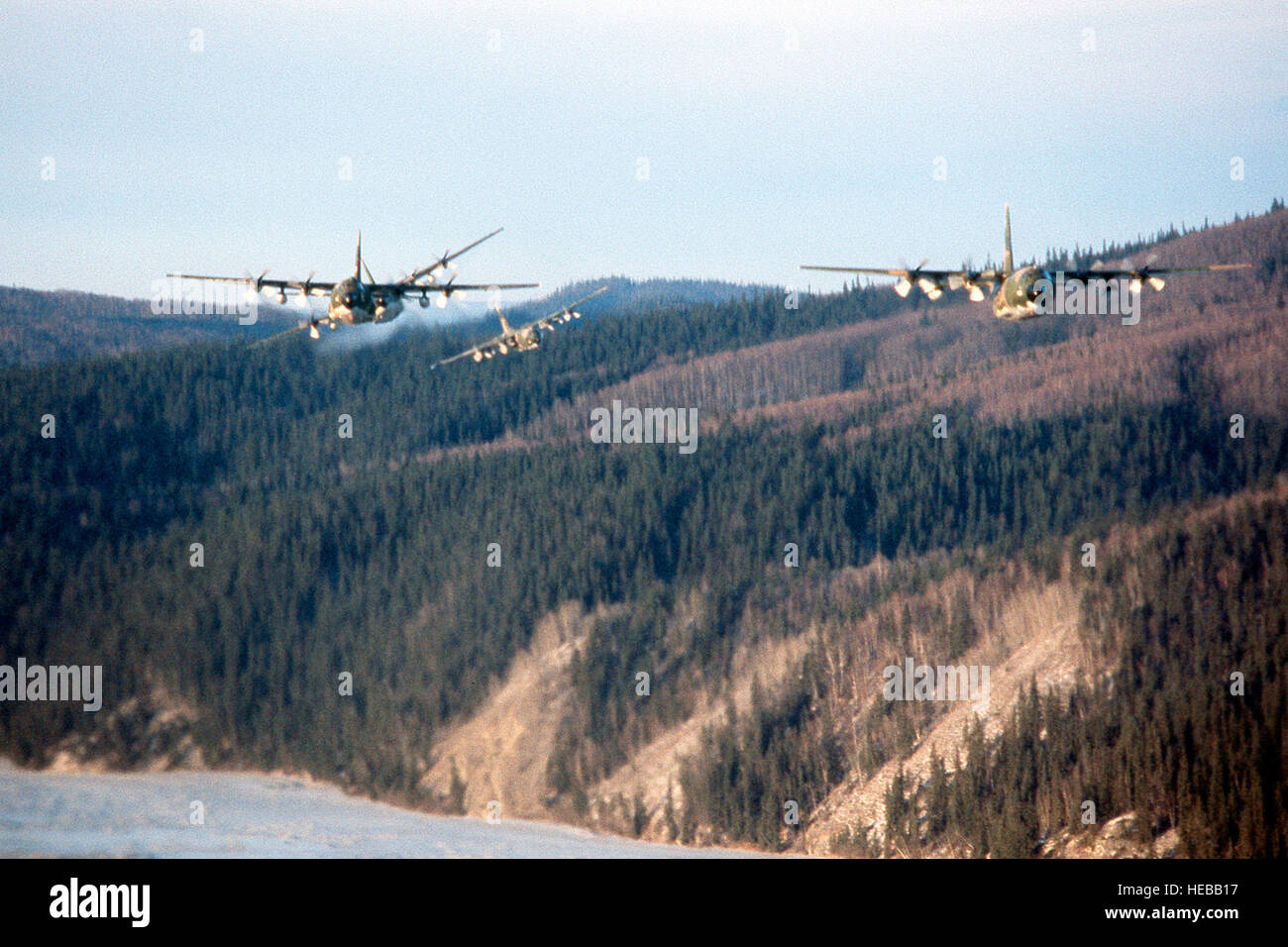 Front view of a formation of four AC-130A Hercules gunship aircraft ...