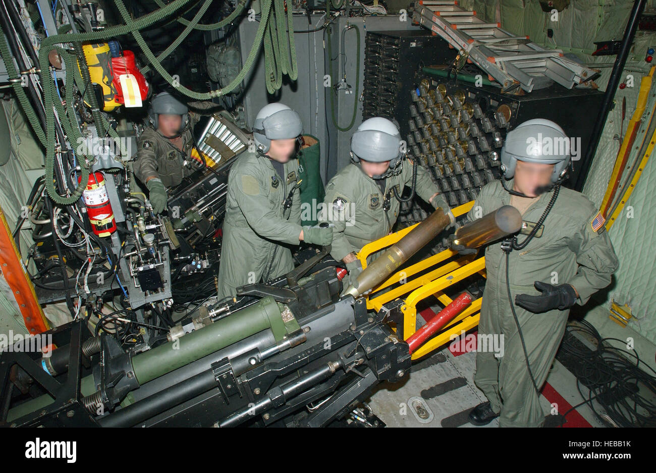 US Air Force (USAF) aircrew members onboard a USAF AC-130U Hercules ...