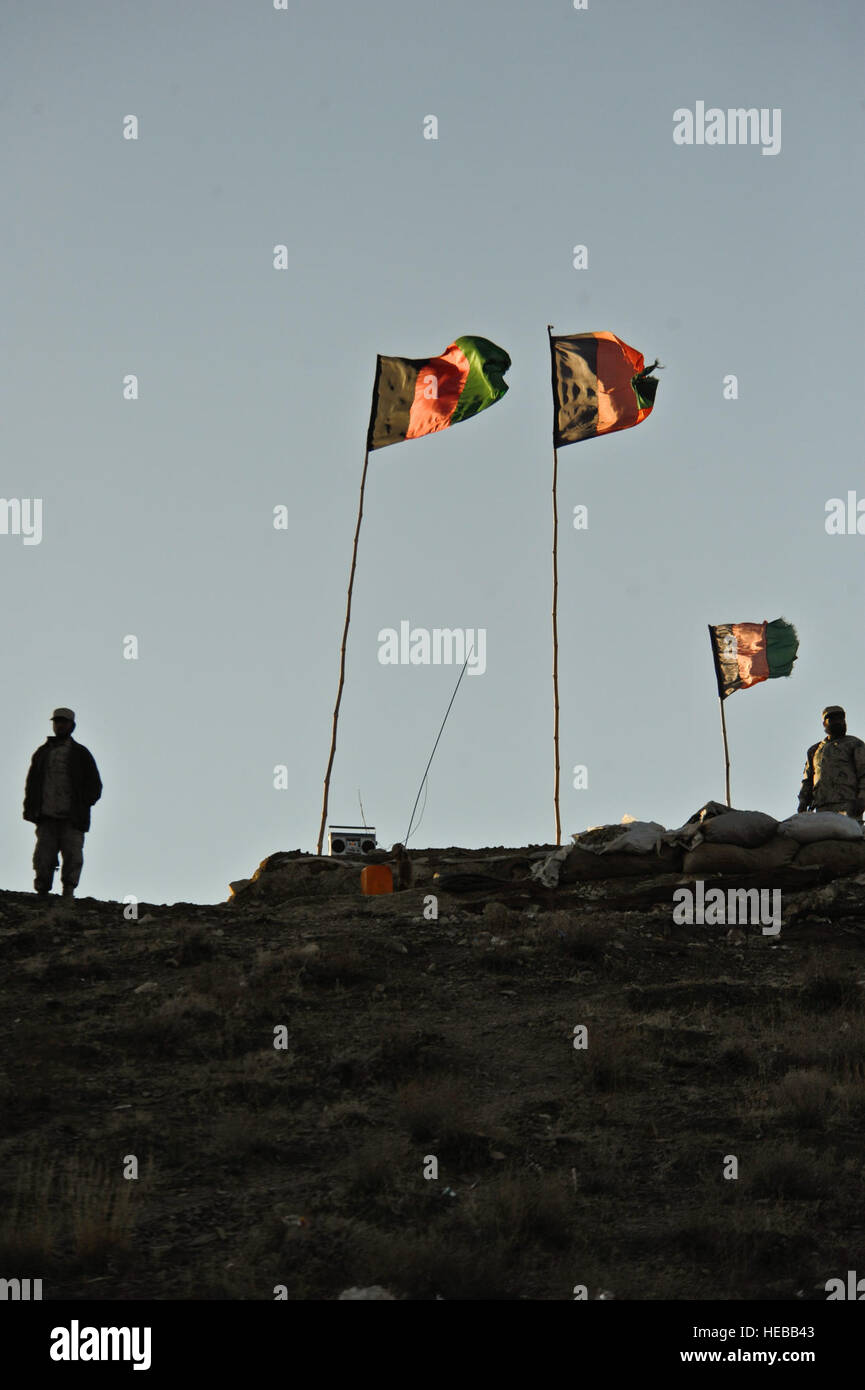 Afghan border policemen patrol a hill in the Wam Valley, Kandahar ...