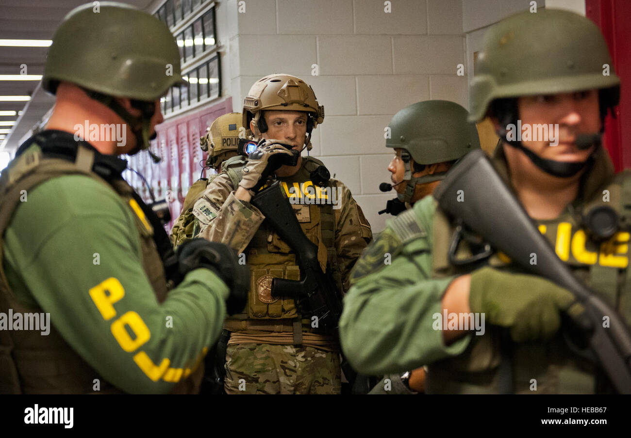 Patrol Officer Lucas Kraus calls into his command center with a status ...