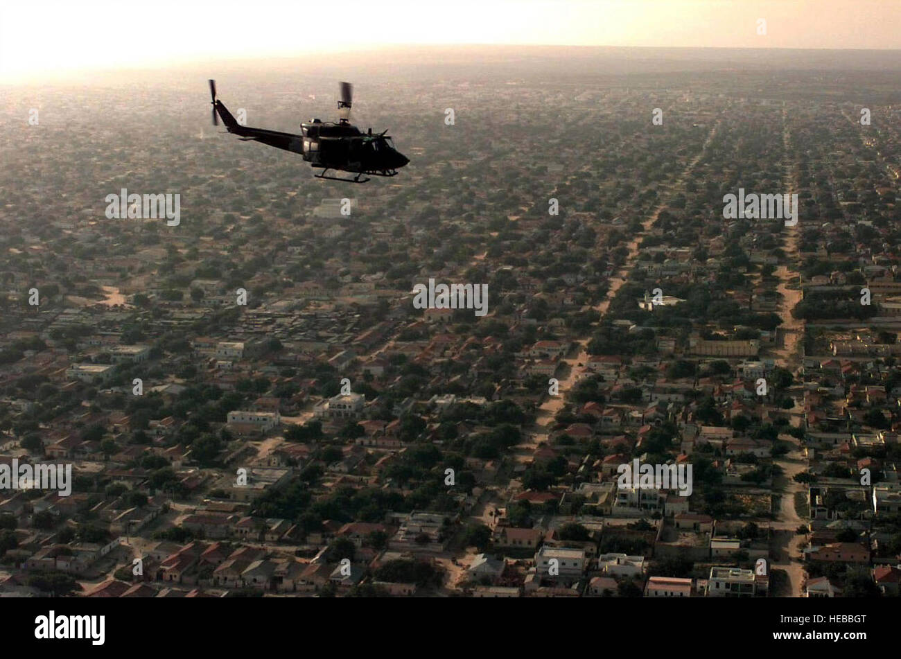 Aerial view, right side profile, of a US Marine UH-1N "Huey" helicopter ...