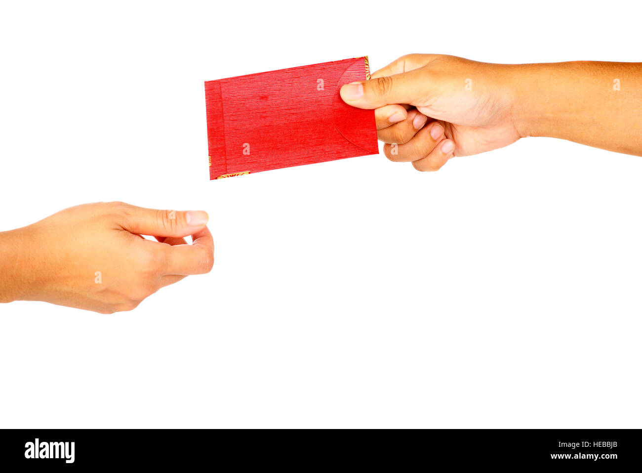 Hand holding chinese red envelope isolated over white background Stock ...
