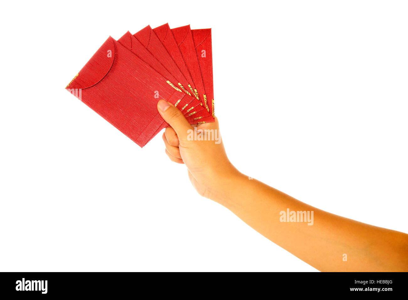 Hand holding chinese red envelope isolated over white background Stock ...