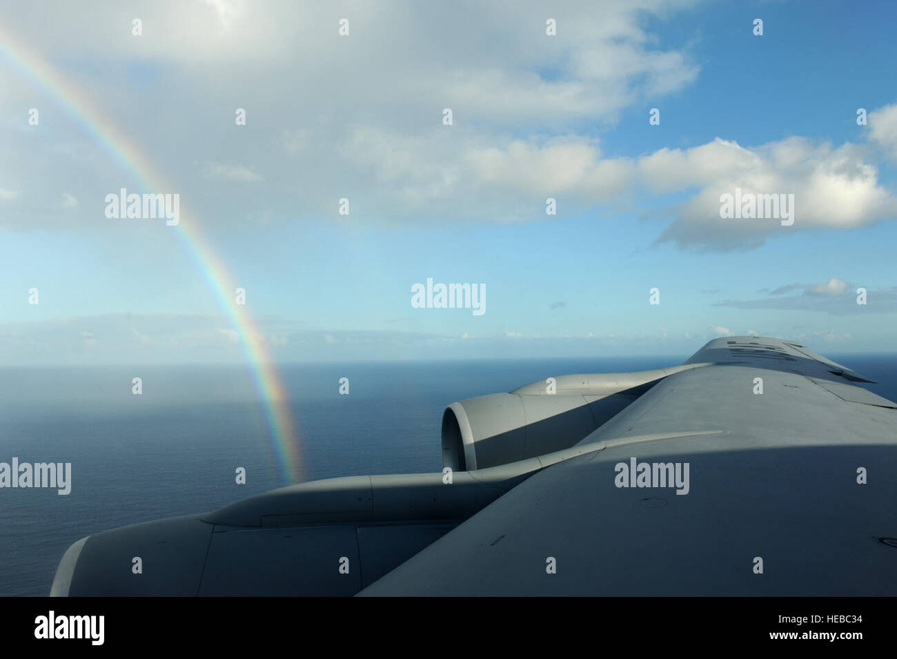 A rainbow is seen from a U.S. Air Force KC-135 Stratotanker aircraft ...