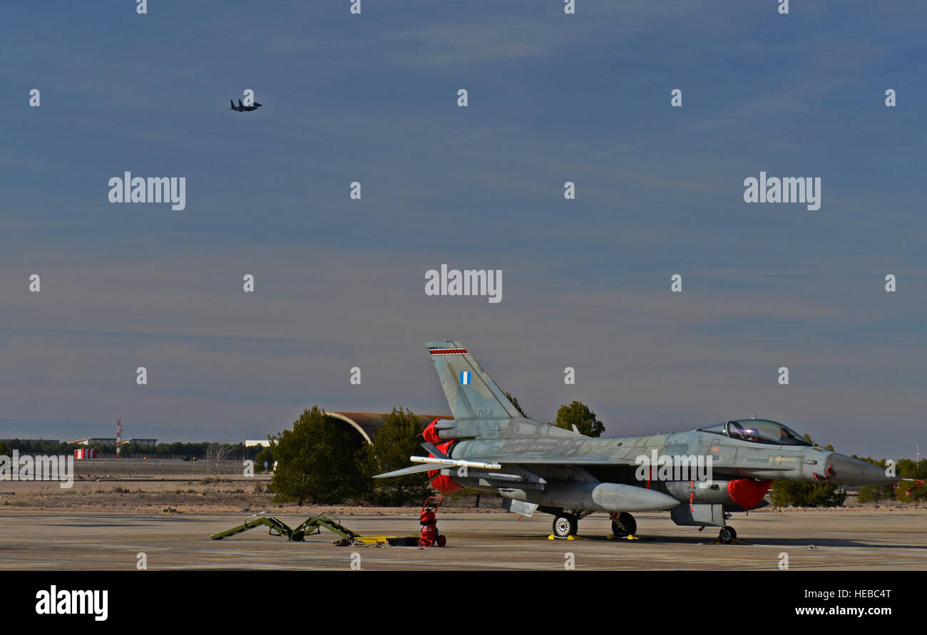 A 492nd Fighter Squadron F-15E Strike Eagle flies over a Greek F-16C ...