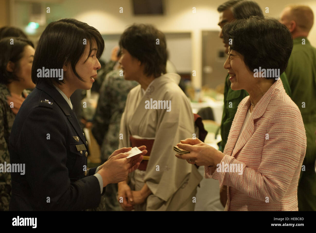 A Japan Air Self-Defense Force member talks with retired Maj. Gen ...