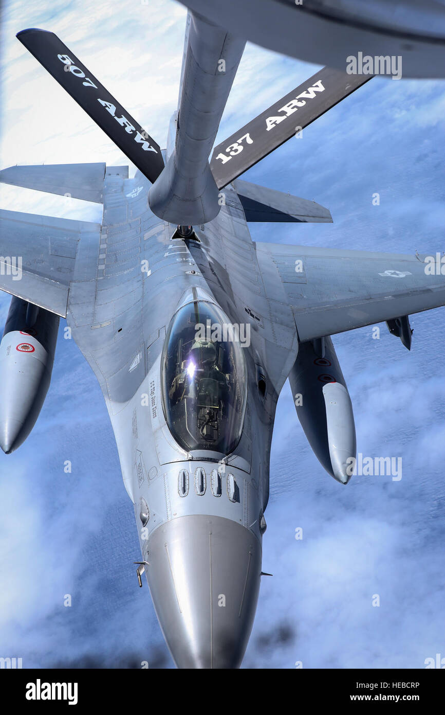 A U.S. Air Force F-16 Fighting Falcon aircraft pilot communicates with ...