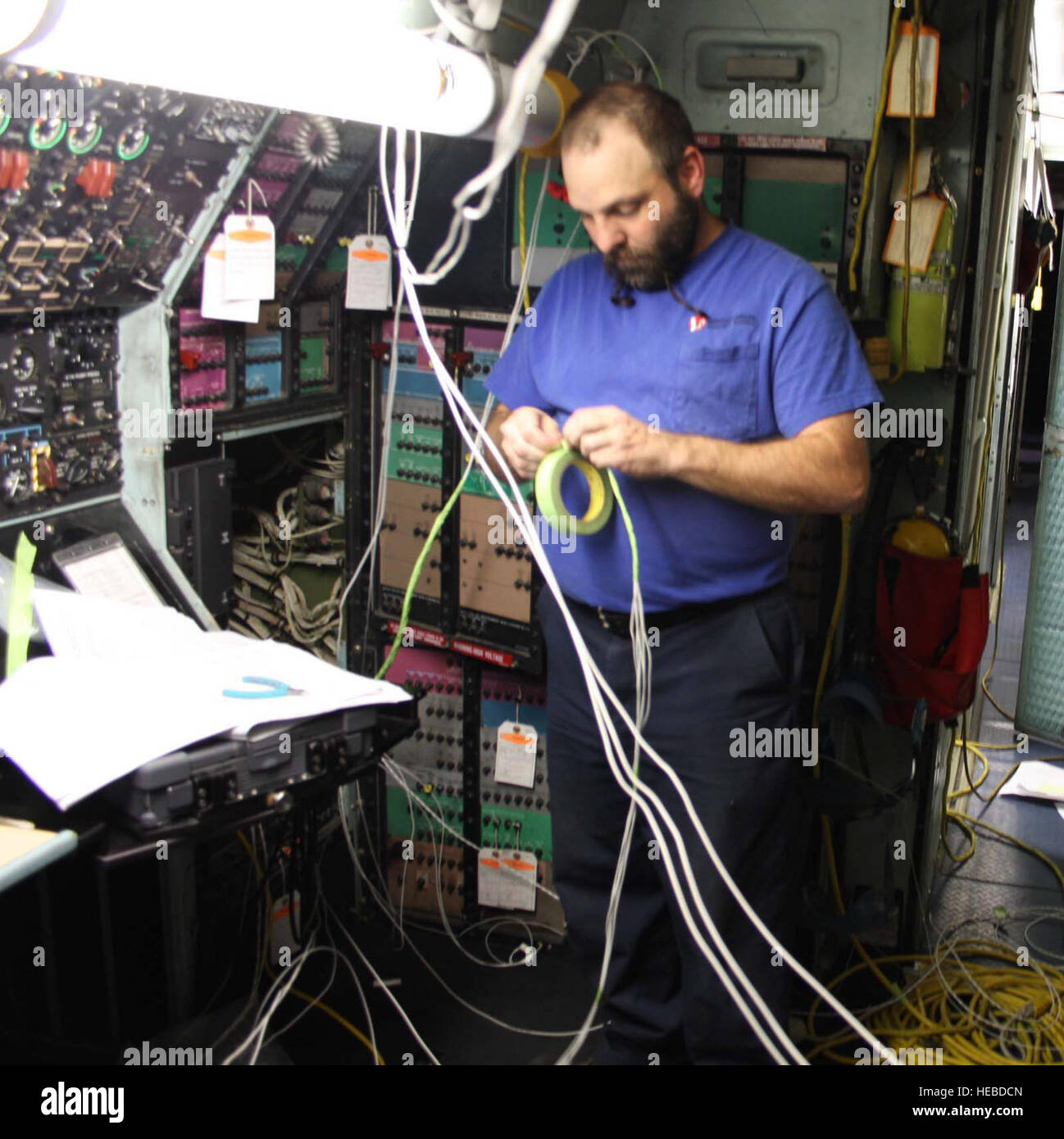 Electrician installs wiring on hi-res stock photography and images - Alamy