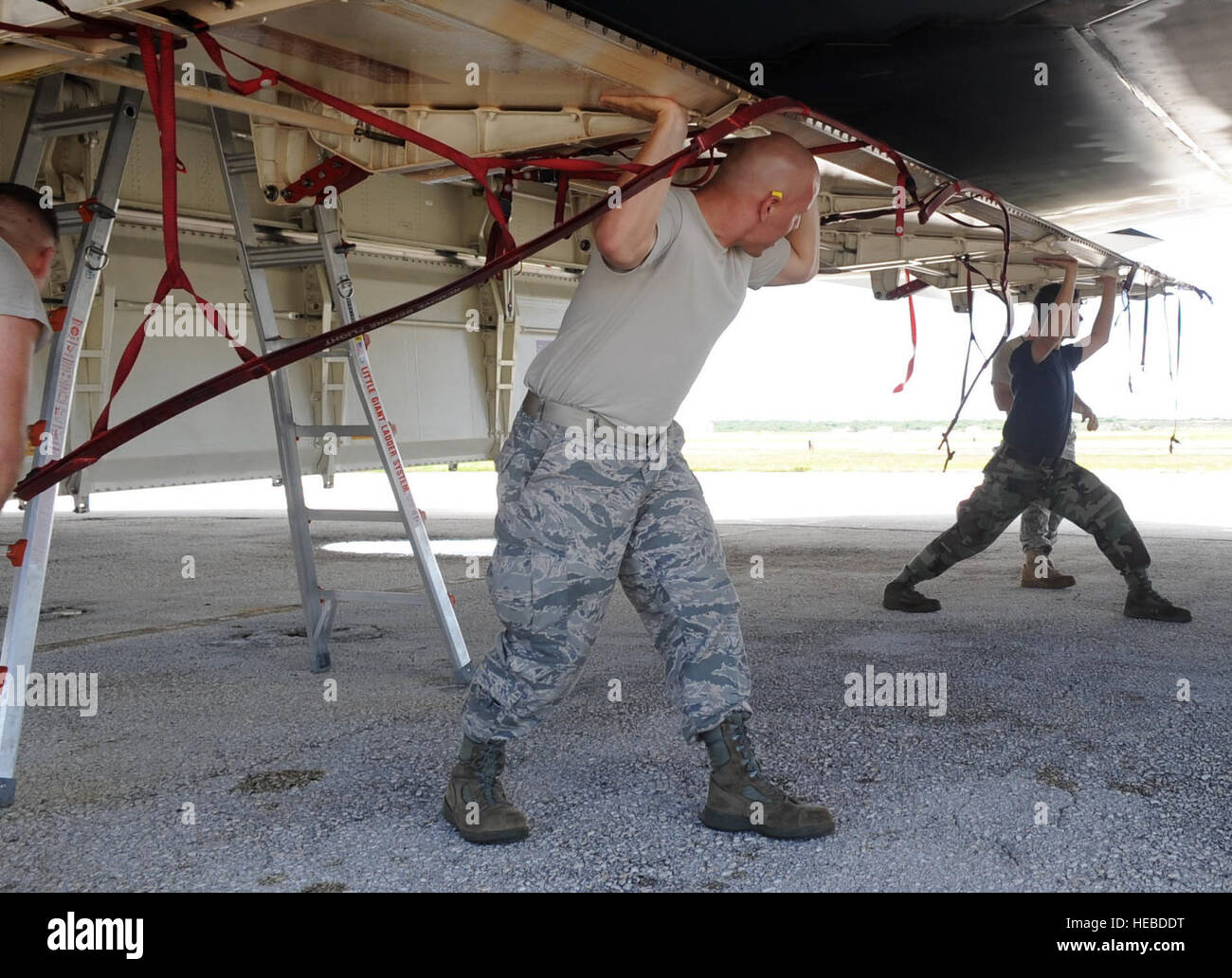 ANDERSEN AIR FORCE BASE, Guam - Weapons load crew members assigned to ...