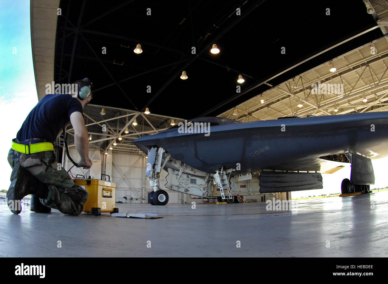 A crew chief with the 509th Aircraft Maintenance Squadron performs a ...