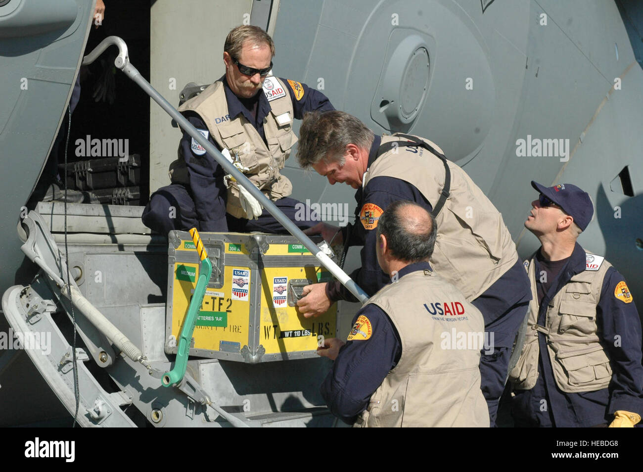 California Task Force 2 members unload humanitarian relief supplies ...