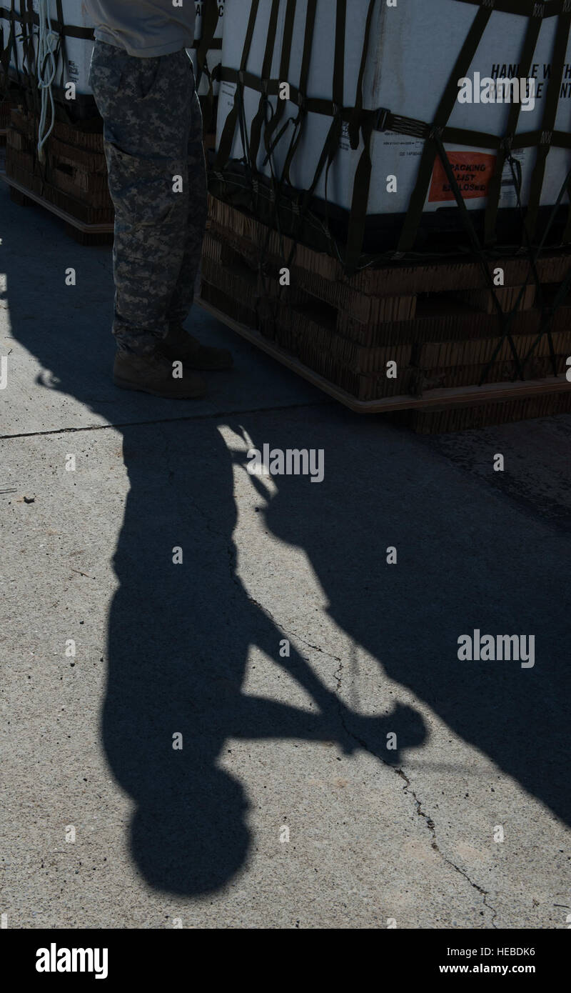 A U.S. Army parachute rigger from the 11th Quartermaster Company, 264th ...