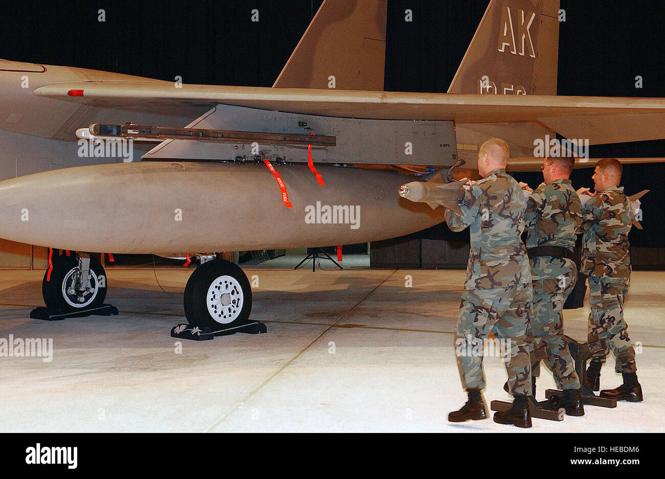 F-15C Eagle from the 12th Aircraft Maintenance Unit is loaded with AIM ...
