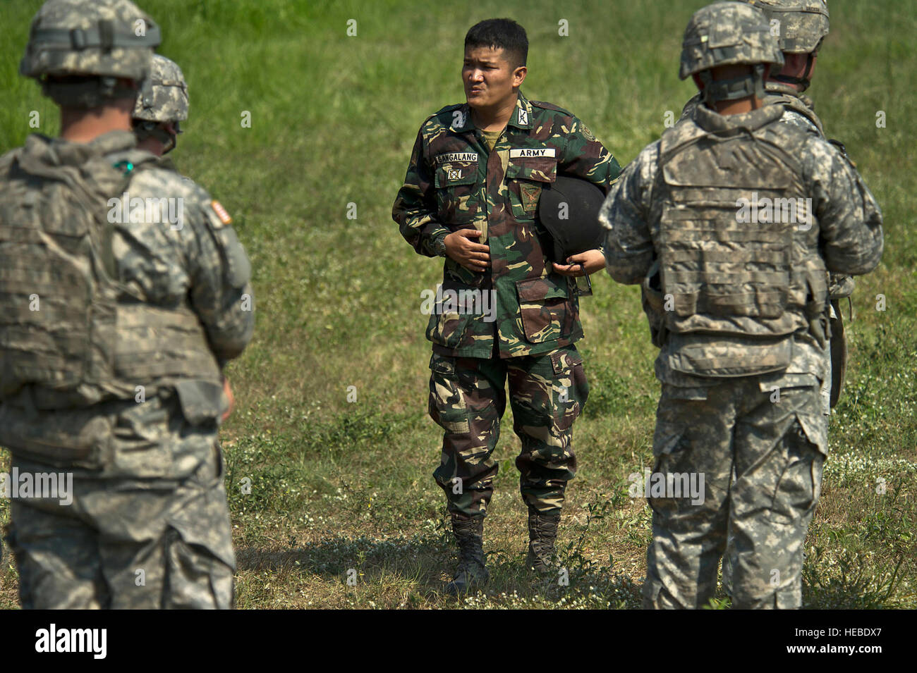 Philippine Army Capt. Heriberto Sangalang (center), 191st Military ...