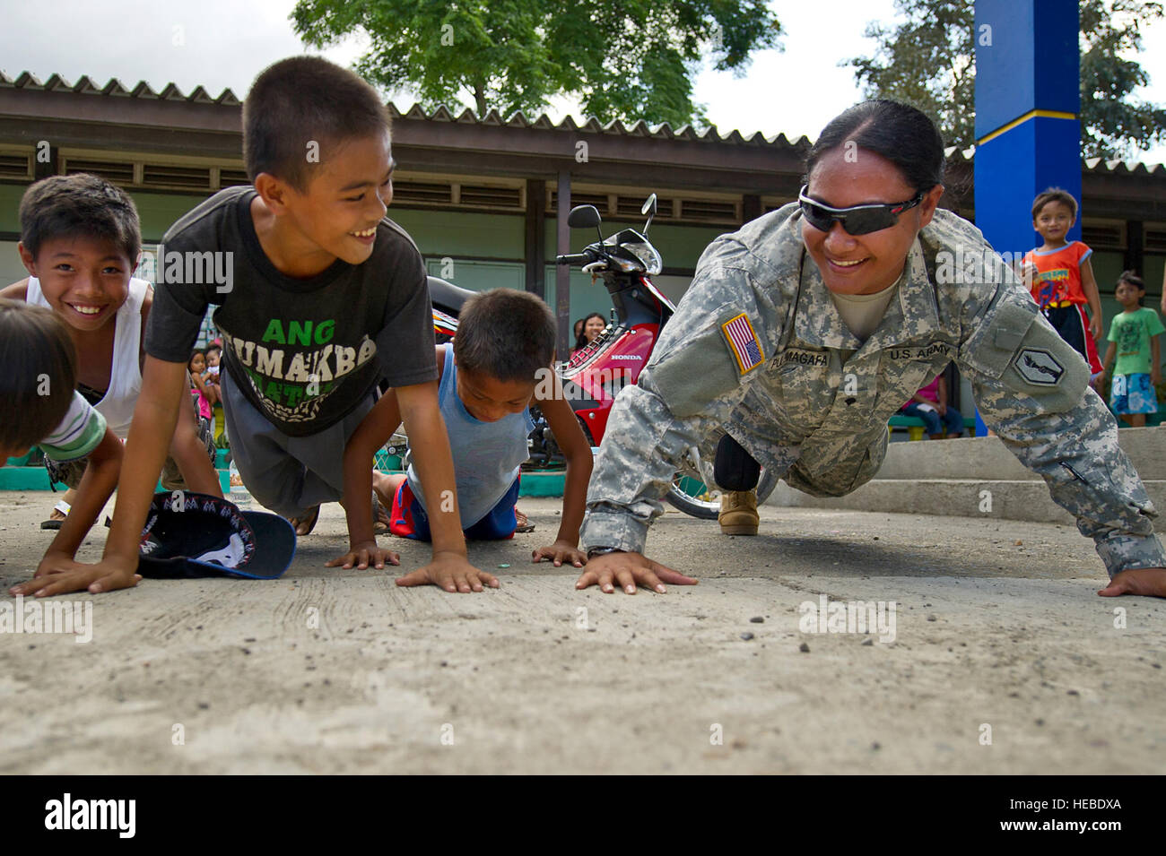 U.S. Army Spc. Petina Pulemagafa,(right) 740th Combat Support Company ...