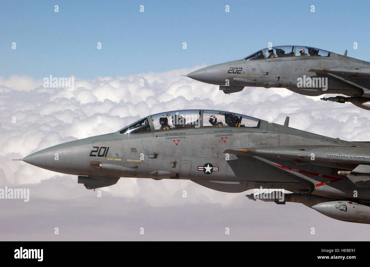 Two US Navy (USN) F-14D “Tomcat” aircraft armed with GBU-12 500-pound ...