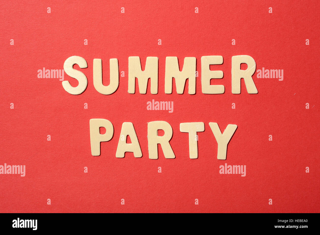 Summer party text on red paper background Stock Photo - Alamy
