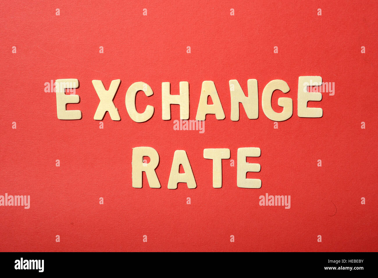 Exchange Rate text on red paper background Stock Photo - Alamy