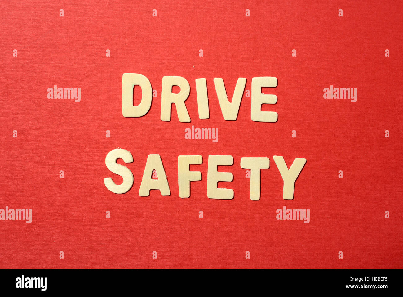 Drive Safety text on red paper background Stock Photo - Alamy