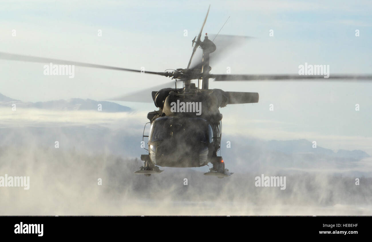 A U.S. Army UH-60 Black Hawk helicopter loaded with Soldiers assigned ...