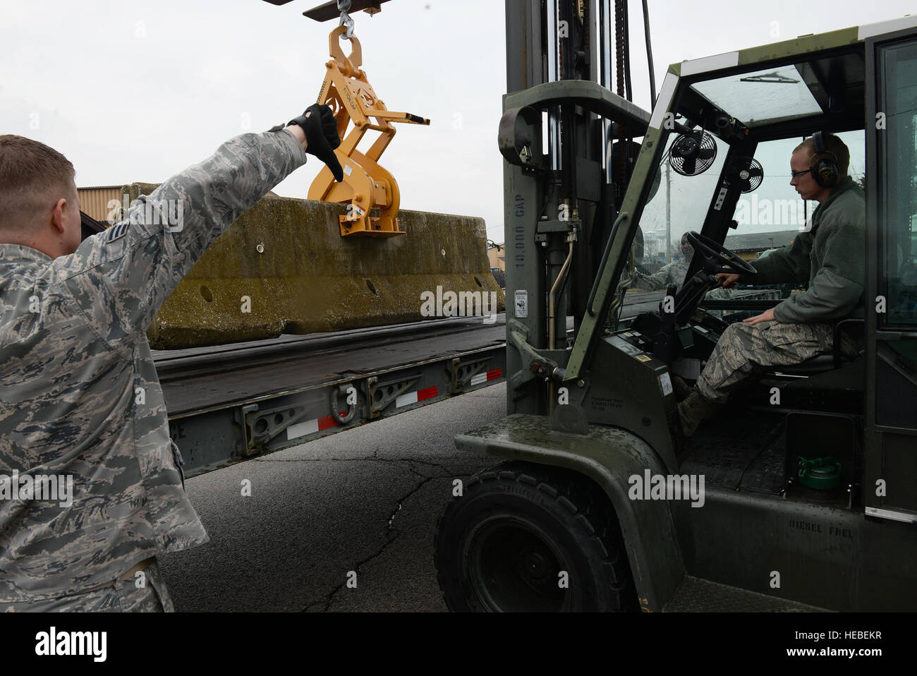 Senior Airman Dainius Milingis and Airman 1st Class Drake Beck, 375th ...