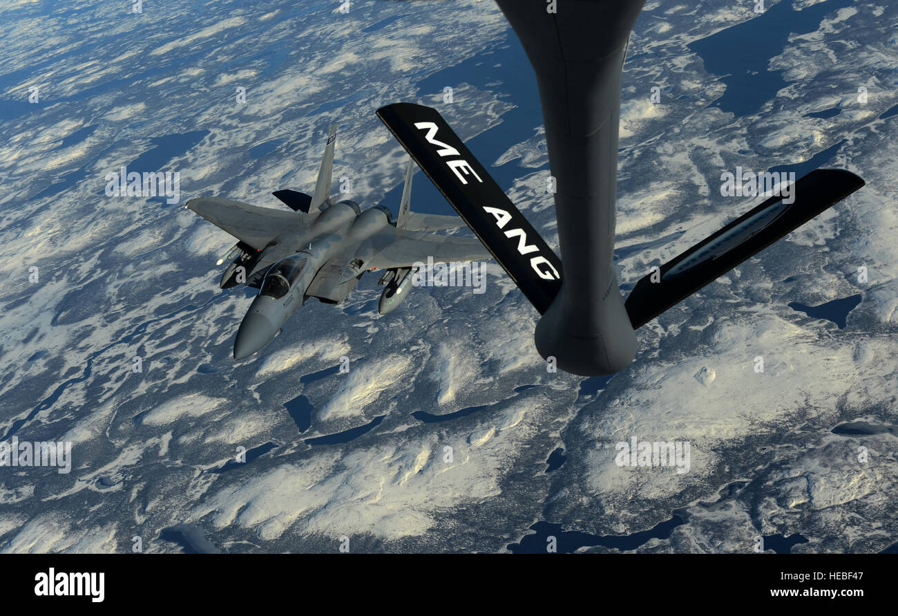 A 125th Fighter Wing F-15C Eagle pulls away from a KC-135 Stratotanker ...