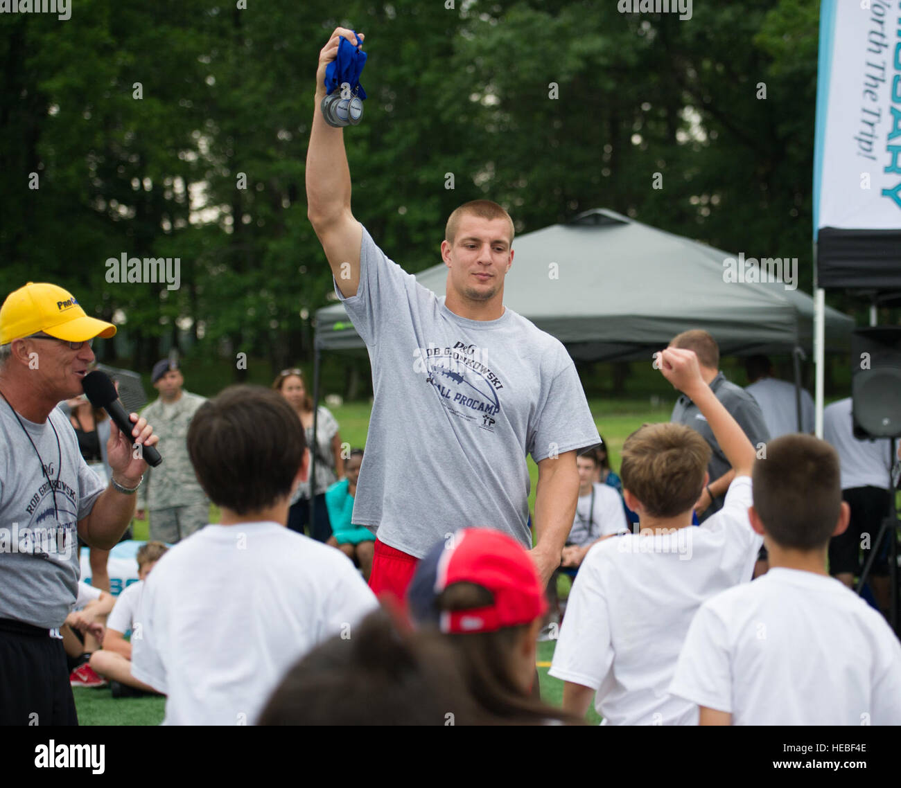 Rob Gronkowski, New England Patriots tight end, hands out medals at the ...