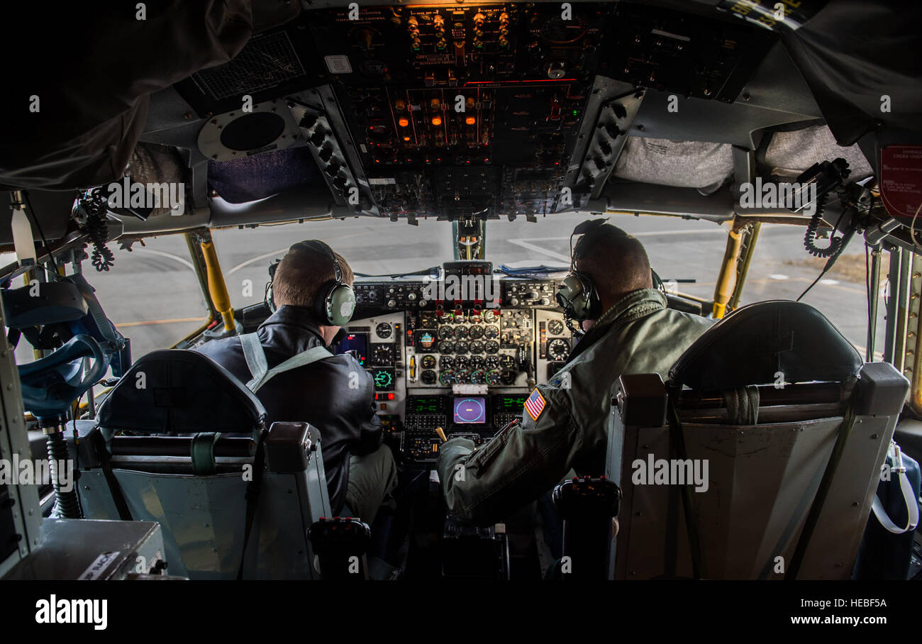 Capt. Nate Williams, aircraft commander, and 1st Lt. Travis Minto, both ...