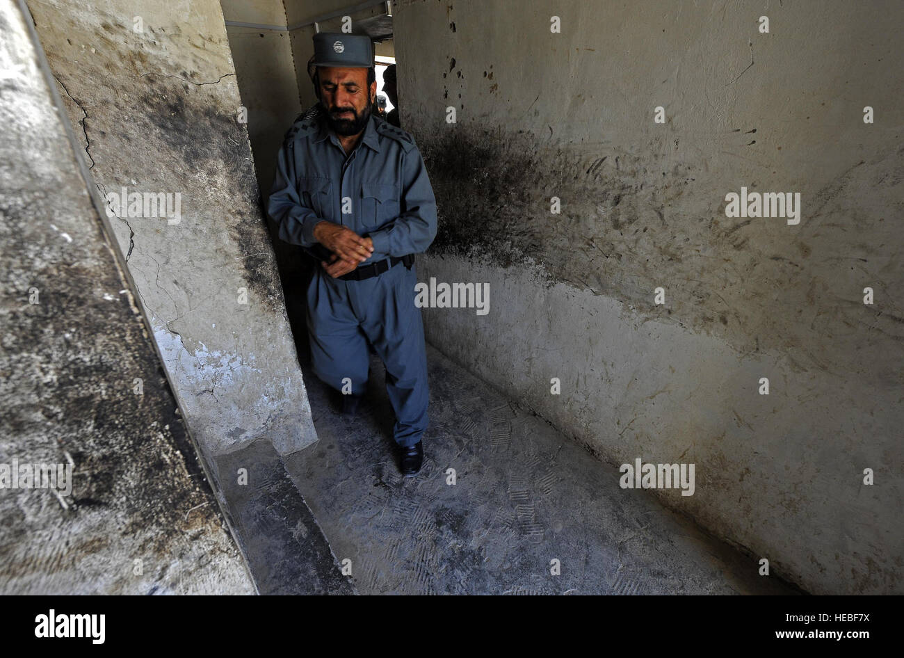 A prison guard climbs the stairs at the Zabul Provincial Prison, as ...