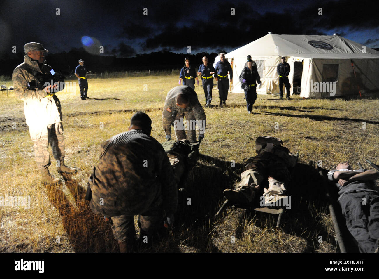 U.S. Service members transport notional mannequin patients to a Florida ...
