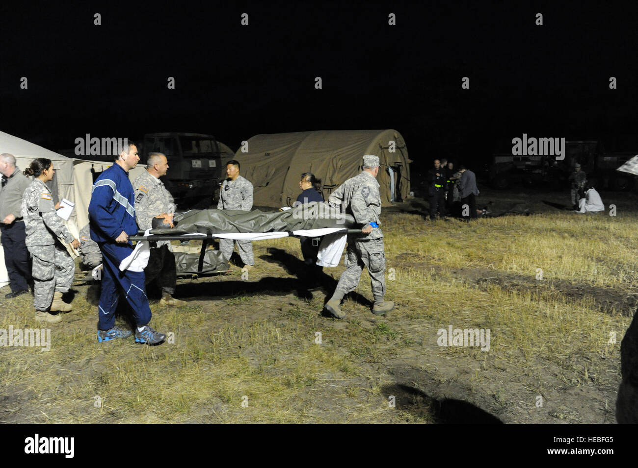 U.S. Service members transport notional mannequin patients to a Florida ...